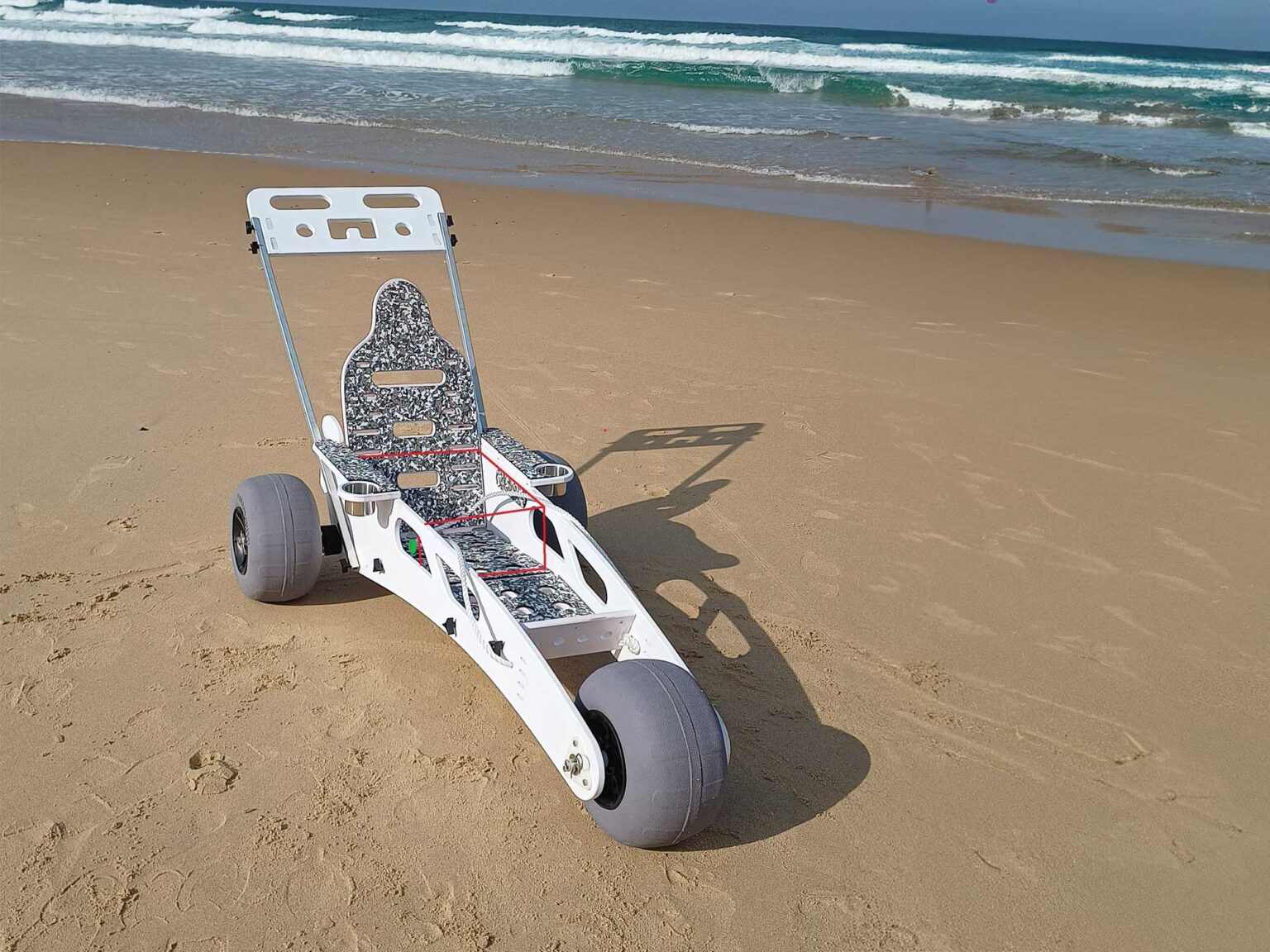 Drop stitch matrix web cushion makes beach wheelchair more accessible.