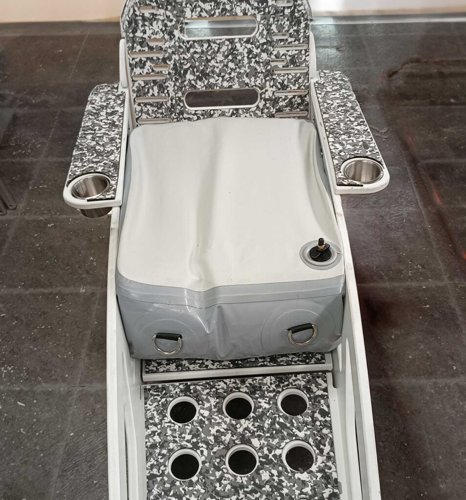 Drop stitch matrix web cushion makes beach wheelchair more accessible.